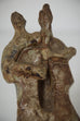 Sculpture of a Figure Playing an Instrument in an Abstract Style ...